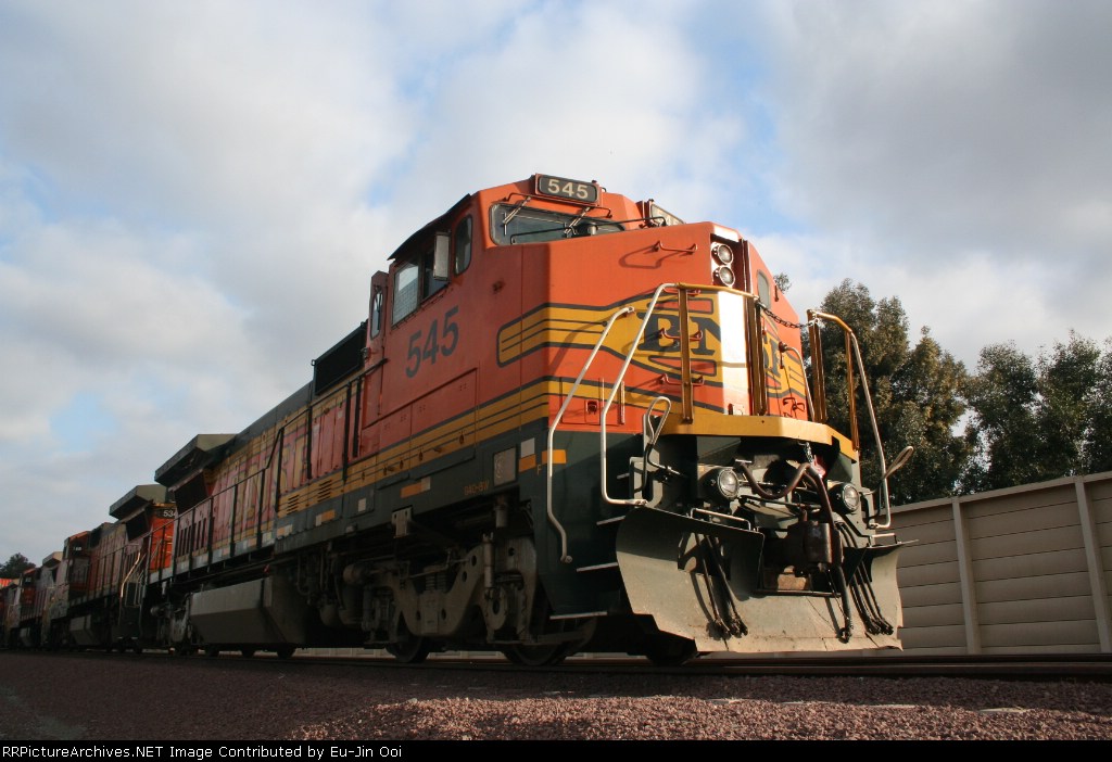 BNSF 545 basking in the sun.